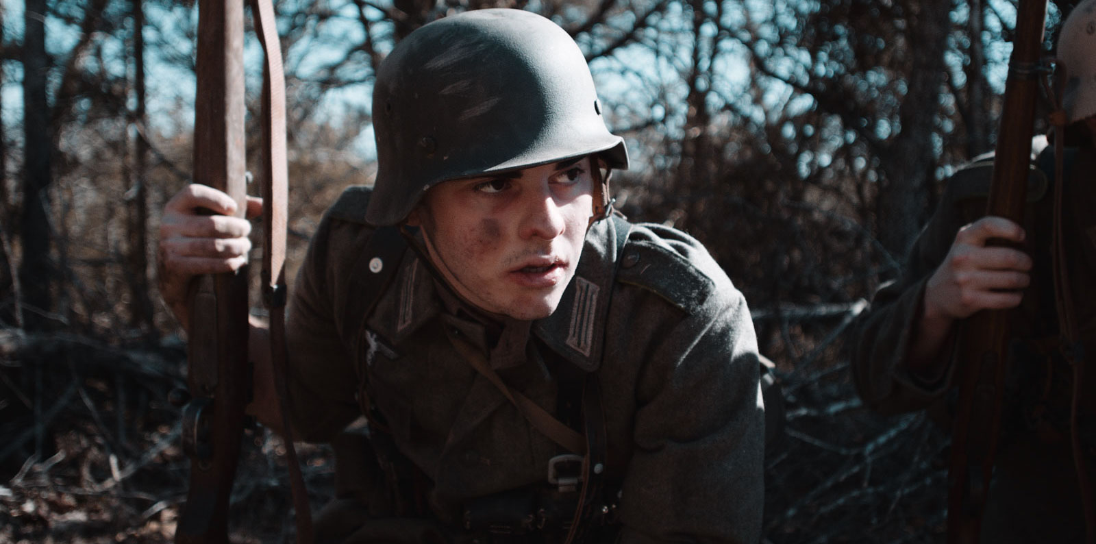 Reveille Featured, Reviews Film Threat